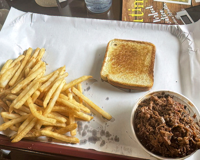 The sandwich basket that launched a thousand road trips. Those golden fries are just waiting to be dipped in that extra sauce you requested.