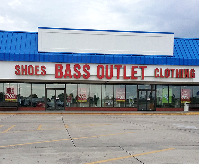 Bass Outlet's bold signage announces shoes, clothing, and the kind of deals that make grown folks giddy.