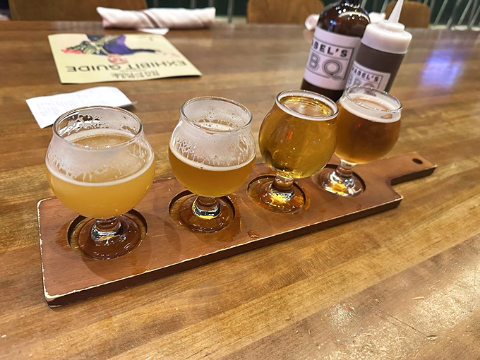 Beer flight heaven! Four perfectly poured craft brews standing at attention, ready to cool the fire of spicy barbecue while adding their own complex notes to the symphony. 