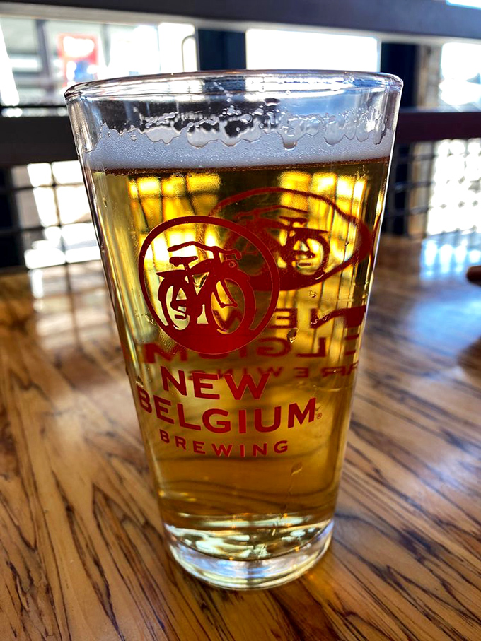 A crisp, golden New Belgium brew catching the light just right &ndash; because sometimes the perfect beer pairing elevates seafood from great to transcendent.