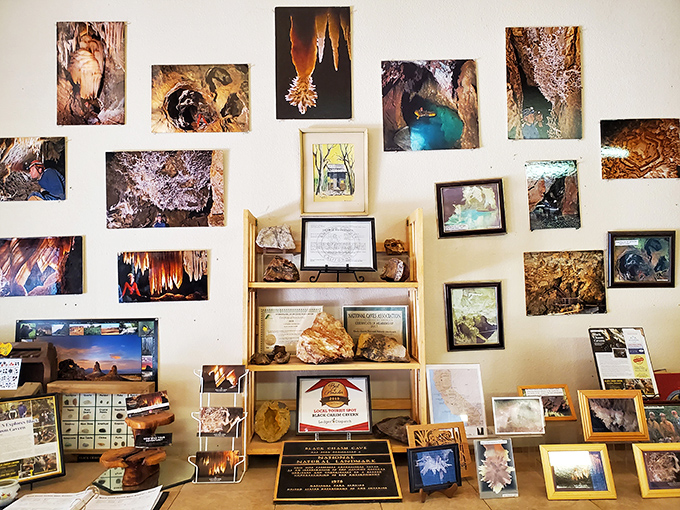 A wall of wonder! The visitor center's photo display offers a preview of the subterranean spectacle awaiting beyond those doors.