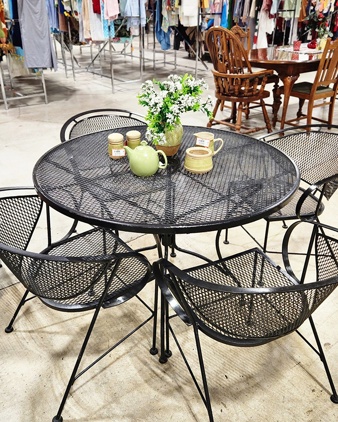 A mesh patio set displays itself perfectly, ready to host summer barbecues and lazy Sunday morning coffees outside.
