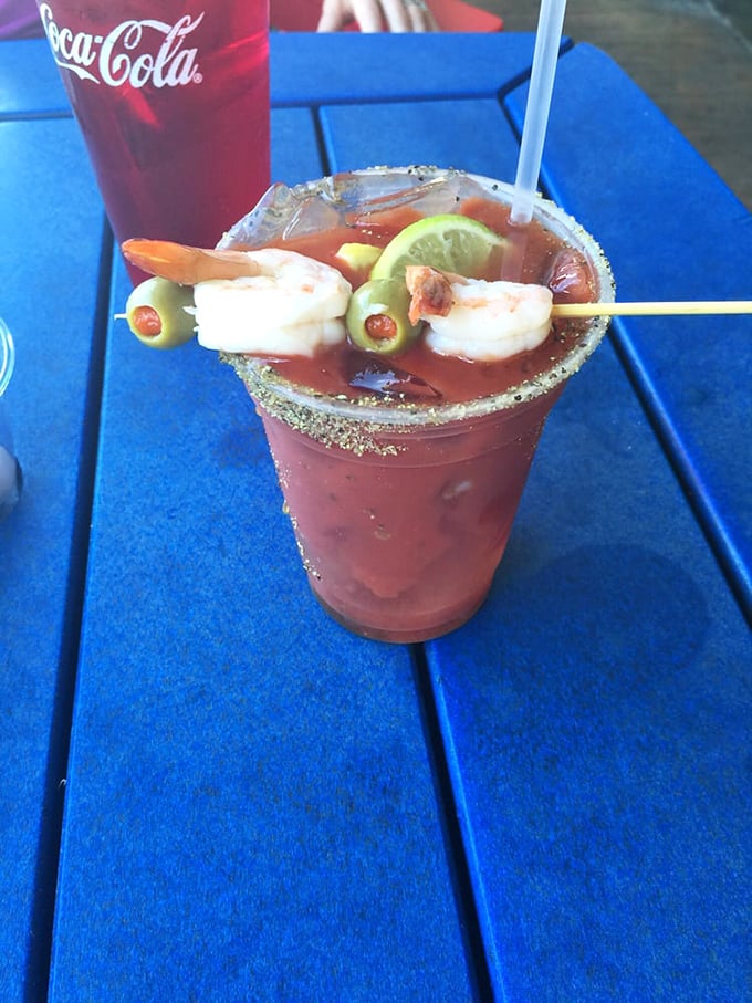 A Bloody Mary that's practically a seafood appetizer. Those olives and shrimp are plotting to steal the show.