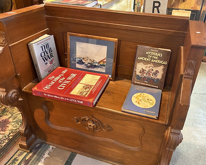 Books nestled in carved wood&mdash;history holding history. That Civil War tome has probably outlived several reading chairs in its literary lifetime.