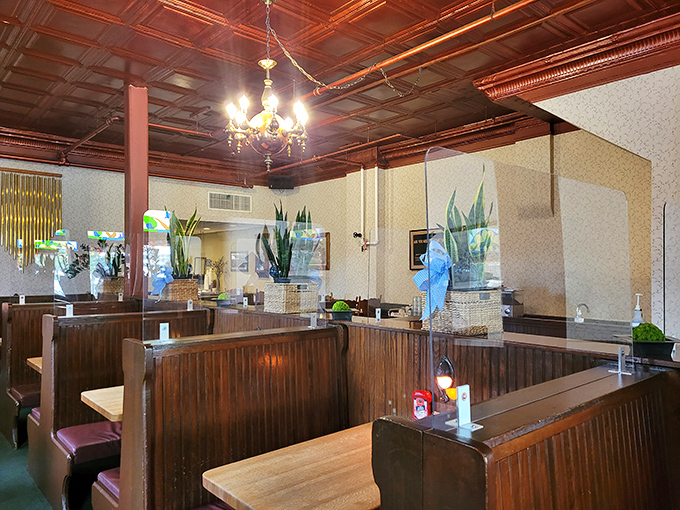 Wooden booths polished by decades of elbows and conversations&mdash;each one a private dining room with a side of nostalgia.