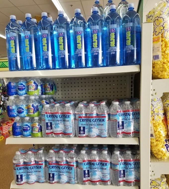Crystal Geyser water bottles lined up like soldiers ready to battle dehydration at rock-bottom prices.