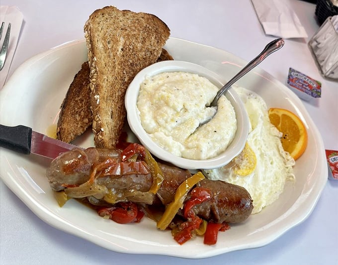 Breakfast sausage with peppers and onions alongside eggs and grits&mdash;a Southern symphony that plays the greatest hits of morning comfort.