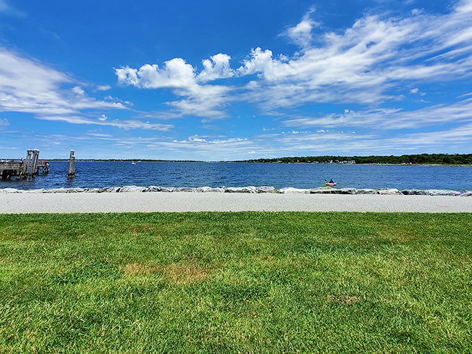 Bristol Town Beach offers a front-row seat to Narragansett Bay's splendor, where grass meets shoreline in a quintessential Rhode Island tableau.