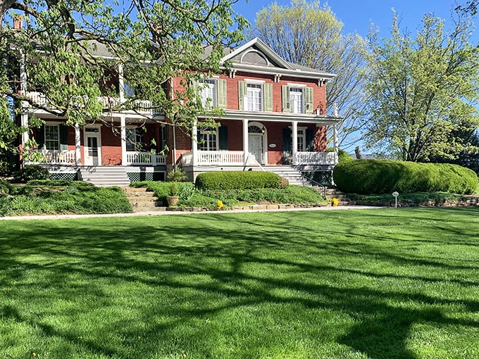 This stately brick home with wraparound porches invites visitors to slow down and imagine life in a more gracious, unhurried era.