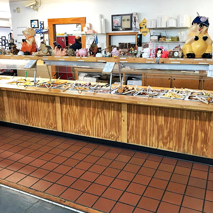 The buffet stretches before you like a barbecue wonderland. The collection of pig figurines watching over the food is both charming and appropriate.