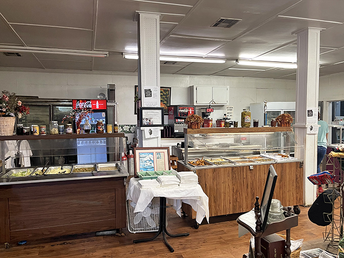 The buffet area gleams with promise, each stainless steel pan holding comfort food that's kept generations of Mississippians coming back for more.