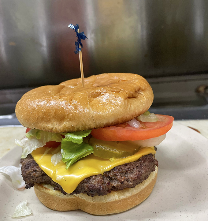 This isn't just a burger &ndash; it's a masterclass in simplicity, with a hand-formed patty, melty American cheese, and fresh veggies on a toasted bun.