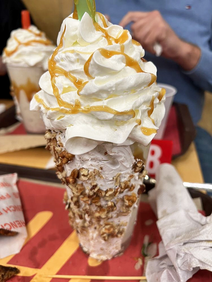 A mountain of whipped cream atop butter pecan ice cream, drizzled with caramel&mdash;this shake is basically therapy in dessert form.