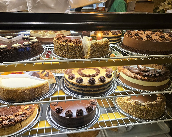 The dessert case&mdash;where willpower goes to die and "I'll just have a bite" becomes the lie we tell ourselves.