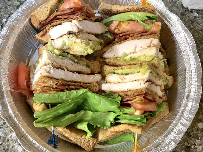 The California Club stands tall and proud &ndash; a skyscraper of turkey, bacon, and avocado that requires both hands and possibly an engineering degree.