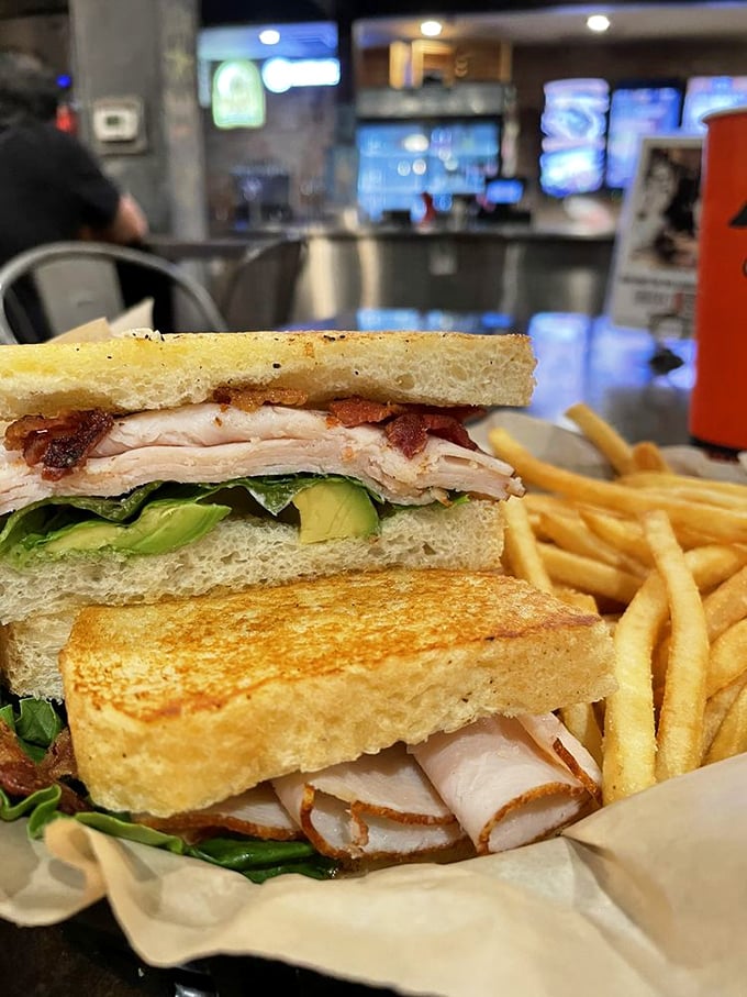 This isn't just a turkey sandwich&mdash;it's architectural perfection with layers of avocado, bacon, and turkey creating the skyscraper of sandwiches your lunch hour deserves.