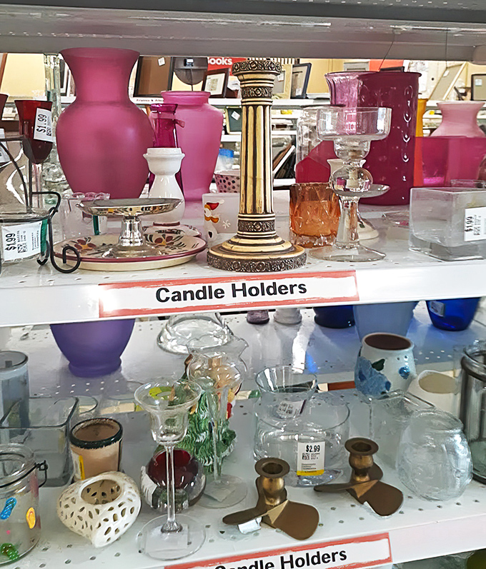 Candle holders ranging from elegant to eccentric. That frosted purple vase definitely starred in someone's 1990s wedding centerpiece.