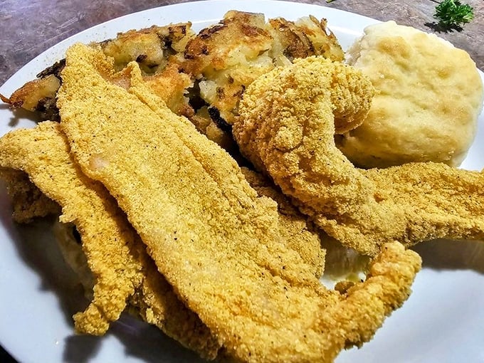 Cornmeal-crusted catfish that crackles with each bite, alongside potatoes that clearly graduated from the School of Perfect Frying.
