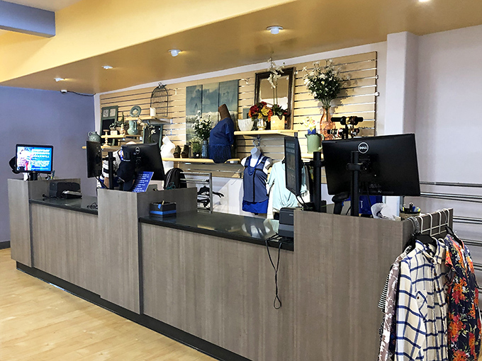 The modern checkout counter at Goodwill's University Avenue location &ndash; where treasures are tallied and bargain victories are celebrated daily.