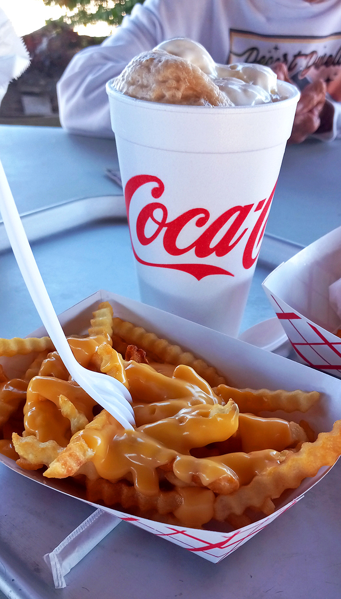 Cheese fries and a frosty root beer: the combo that's launched a thousand road trips. Comfort food that speaks a universal language.