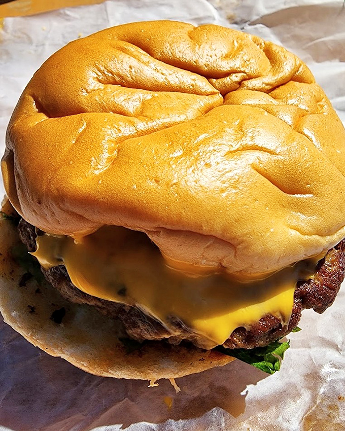 A burger that doesn't try to be trendy &ndash; just a properly seasoned patty with melted cheese on a pillowy bun that satisfies a primal hunger.