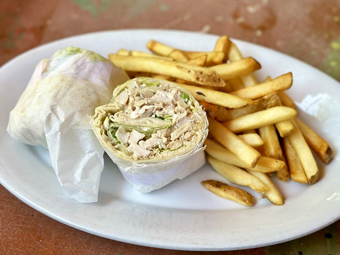 The chicken wrap—proof that good things come in cylindrical packages, especially when paired with perfectly golden fries.