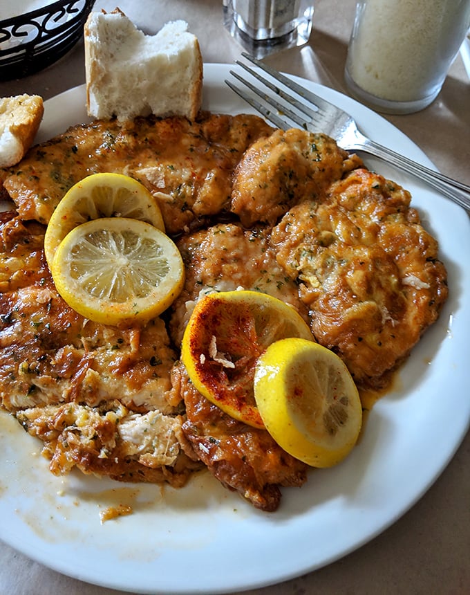 Chicken francese with enough lemon to brighten your day and your palate. Sunshine on a plate, with a side of "why can't I make this at home?"