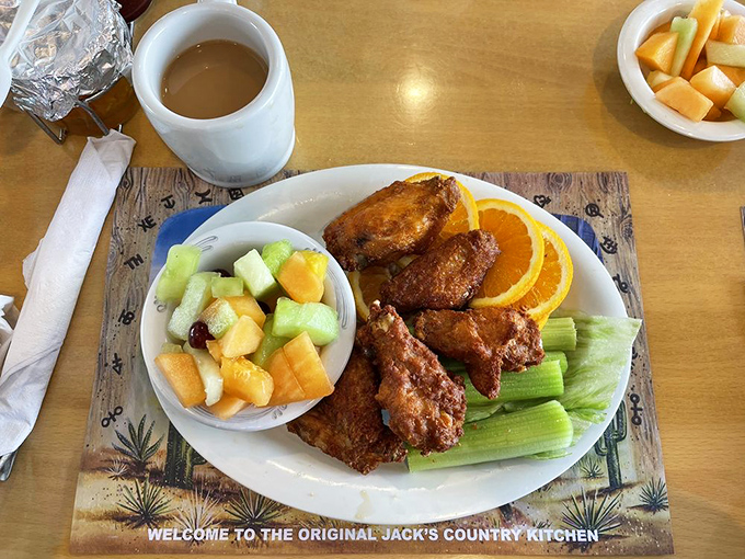Chicken wings with celery and fresh fruit&mdash;proof that Jack's knows how to do lunch just as brilliantly as breakfast.