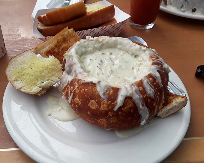 Clam chowder served in a sourdough bread bowl&mdash;the ultimate edible dishware innovation. When you finish the soup, the real fun begins.