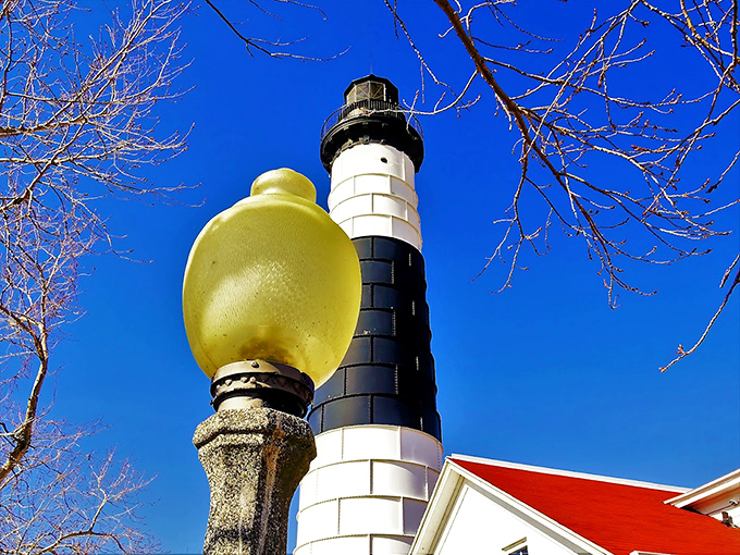 That yellow lamp post seems to be saying, "I may not be as tall, but I've got my own important job to do!" Lighthouse little brother syndrome.