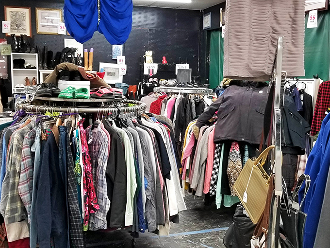 Vintage clothing racks hold fashion time capsules where yesterday's styles await their inevitable comeback at fraction-of-retail prices.