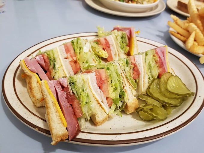 This club sandwich gets stacked higher than your expectations, delivering layers of pure satisfaction. 