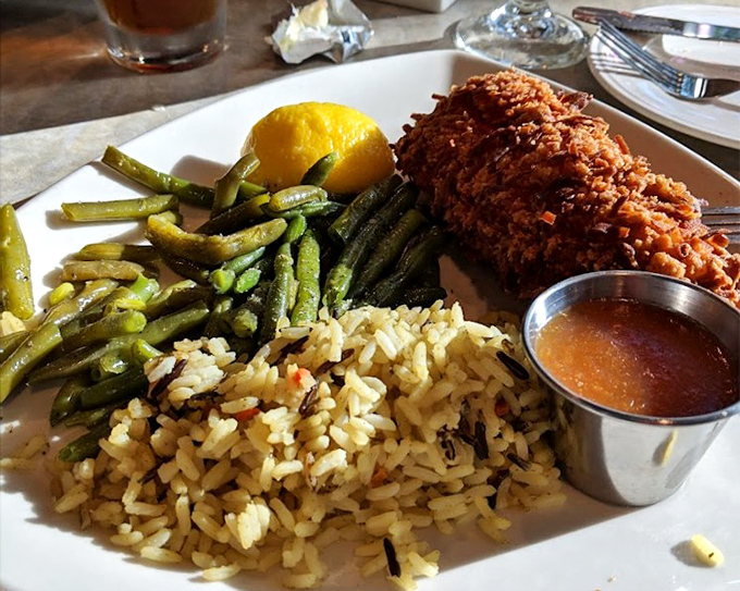 This isn't just dinner&mdash;it's a vacation on a plate where coconut-crusted cod meets tropical rice and perfectly cooked vegetables.