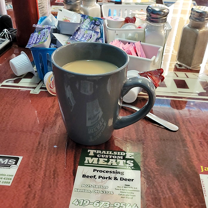 That mug doesn't just hold coffee; it contains liquid motivation for conversations that solve the world's problems by noon.