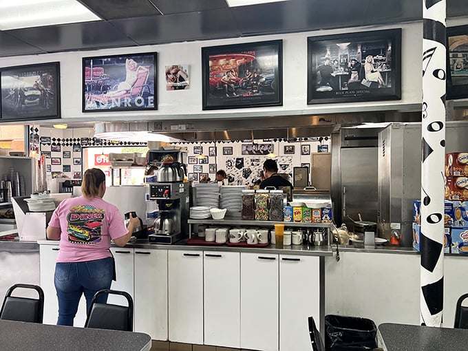 The beating heart of any great diner – where coffee flows freely and breakfast dreams come to life behind the counter.