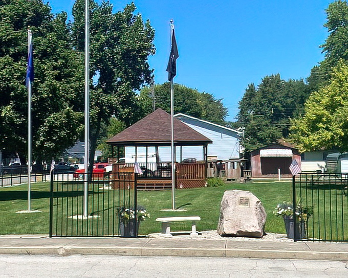 Flag poles stand tall in the community park, where patriotism isn't just for holidays but woven into the daily fabric of Orestes life.