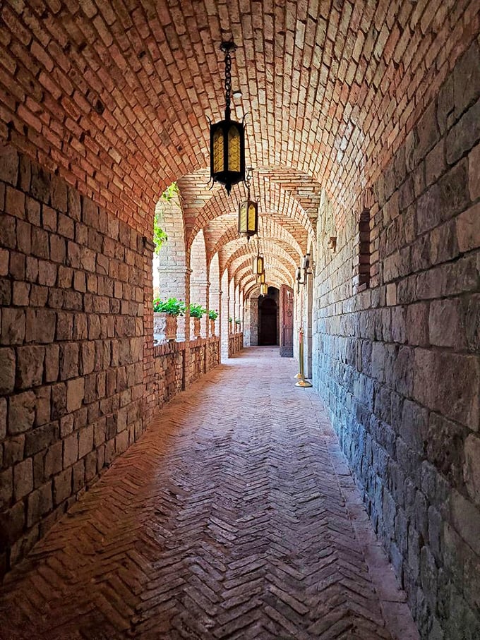 Herringbone brick floors and hanging lanterns creating atmosphere so authentic you'll check for wandering minstrels.