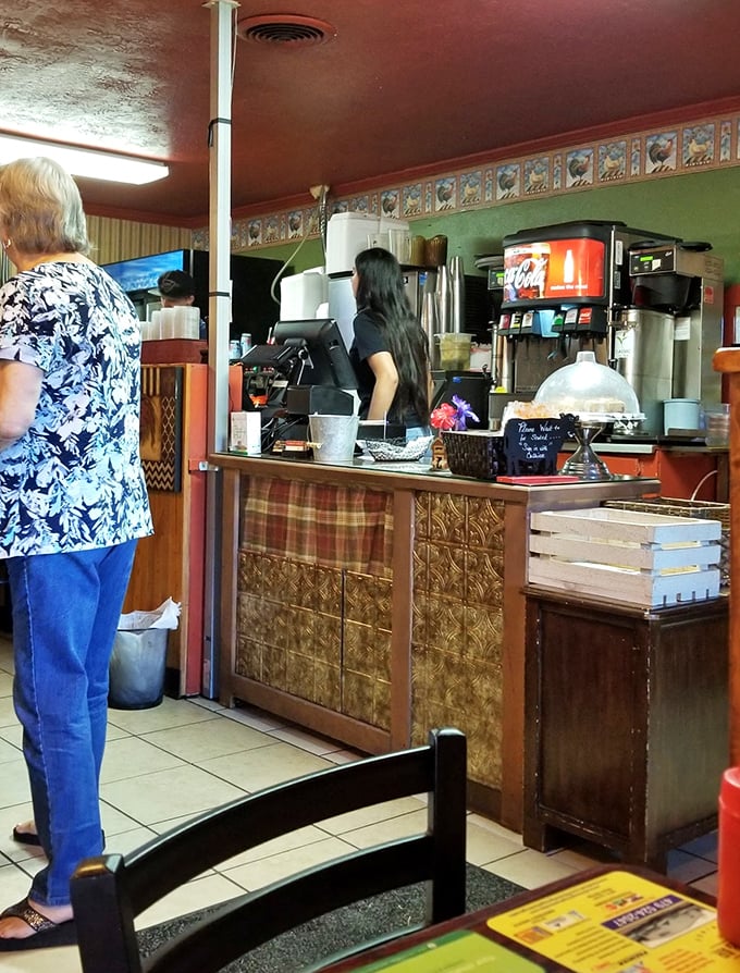 The counter area&mdash;where coffee flows freely and the staff remembers your order before you've fully settled into your seat.
