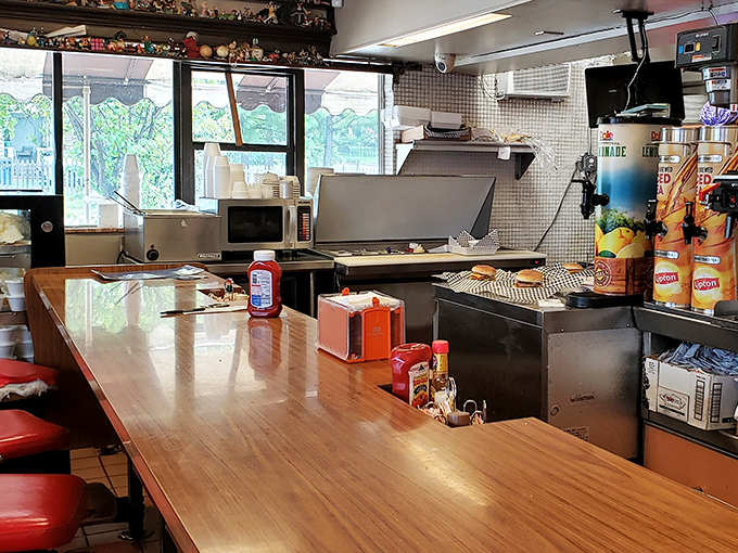 Behind the counter at Brownie's&mdash;where burger magic happens on well-seasoned grills that hold decades of delicious secrets in their seasoned surfaces.