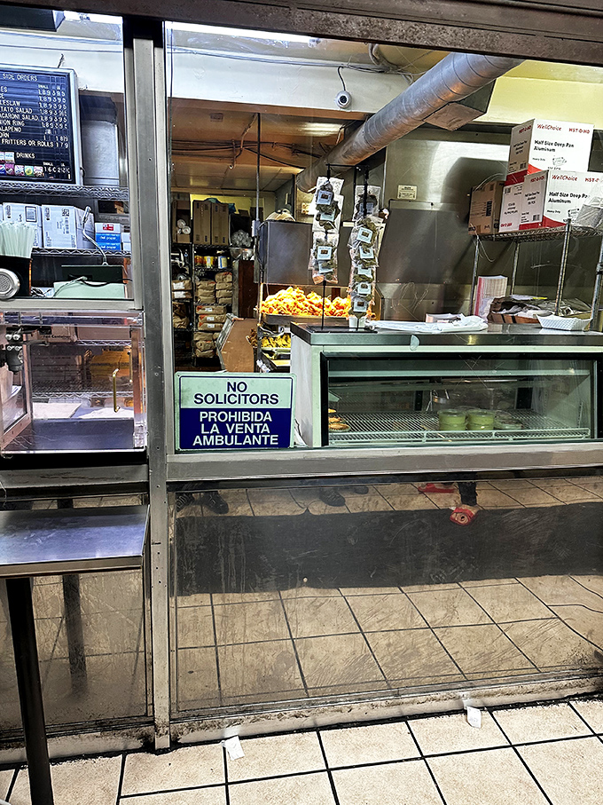 The business end of deliciousness&mdash;where orders become reality and chicken transforms from poultry to poetry through hot oil magic.