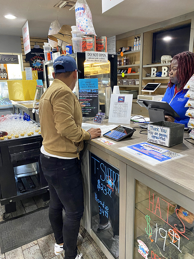 The gateway to greatness. This unassuming counter is where barbecue dreams come true and diet plans go to die—gloriously and without regret.