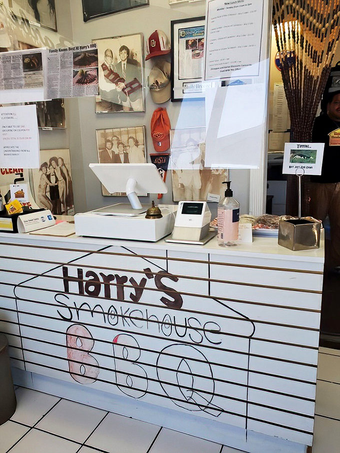 The counter where BBQ dreams come true. Simple, functional, and adorned with the memorabilia of a place that's earned its reputation one plate at a time.