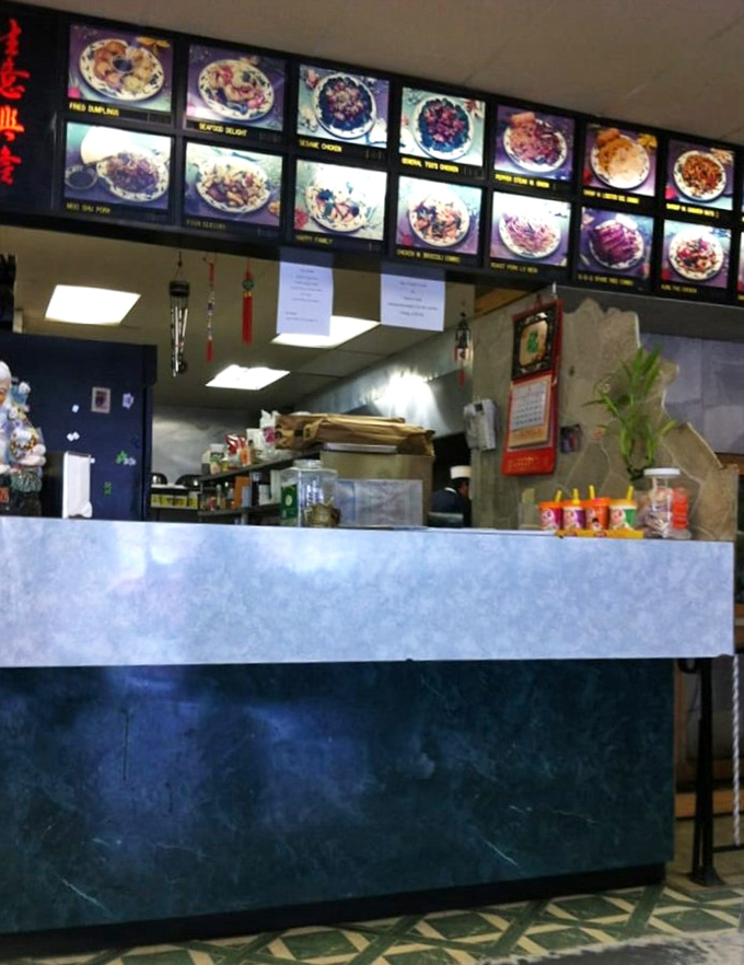 Behind the counter magic happens with military precision &ndash; where dishes come to life under the watchful eyes of illuminated menu photos.