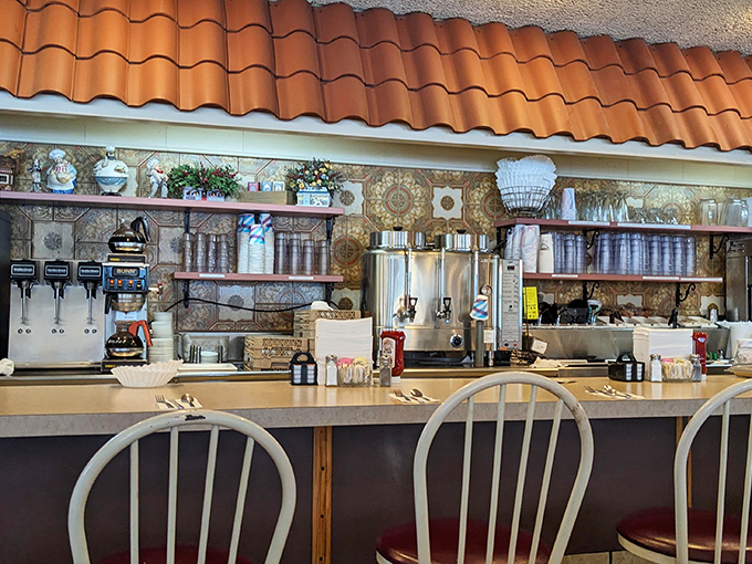 The counter area&mdash;where coffee flows freely, regulars exchange local gossip, and the breakfast specials are announced like breaking news.