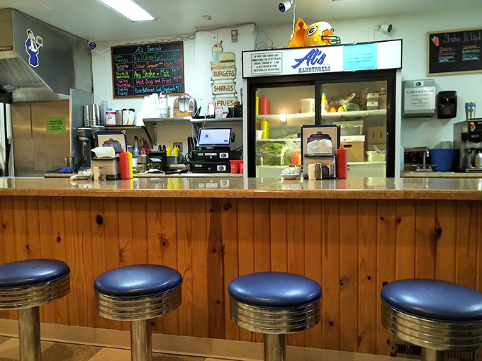 The beating heart of burger paradise&mdash;a counter where magic happens and diet plans go to die gloriously.