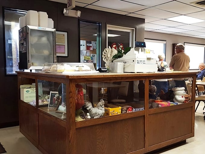 The heart of Chicken House operations &ndash; a wooden counter showcasing chicken-themed decor that tells you they're serious about their specialty.