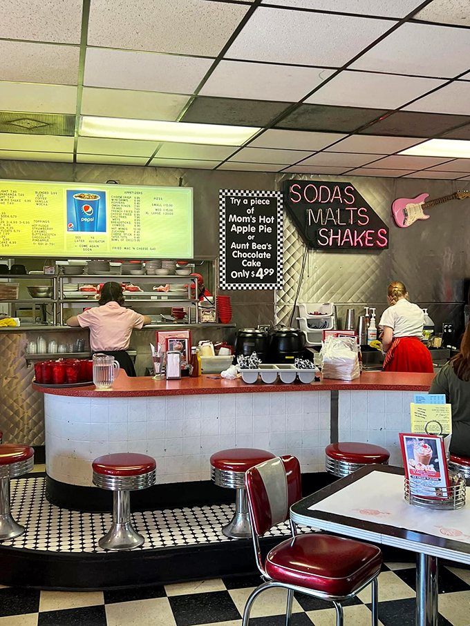 The counter experience&mdash;where solo diners become regulars and servers remember your order before you sit down.