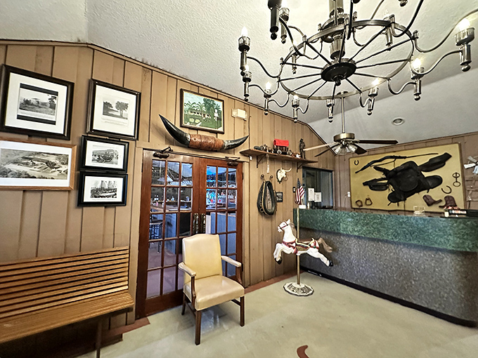 Western charm meets Florida hospitality in this wood-paneled entrance area. That longhorn on the wall isn't just decoration&mdash;it's a promise! 