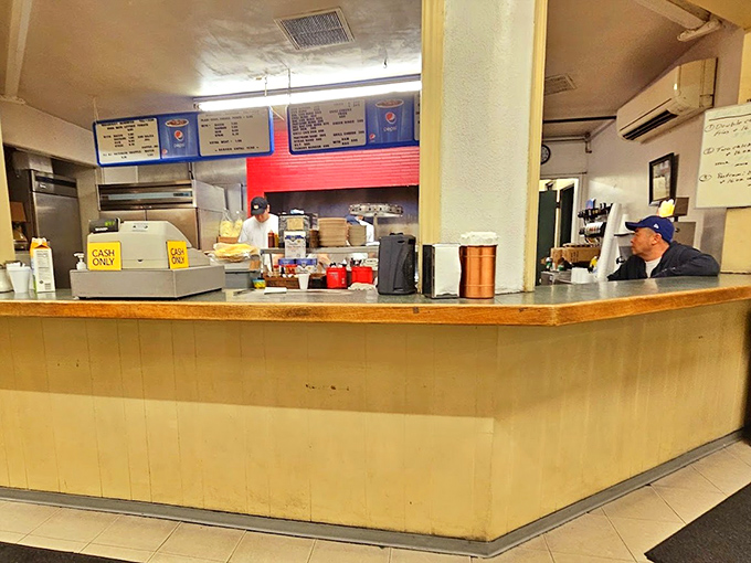 The counter where dreams are made and orders are taken. Cash only&mdash;because some traditions, like exceptional breakfast burritos, never need upgrading.