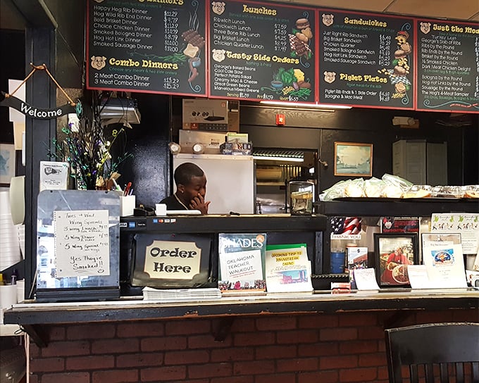 The ordering counter—where dreams are placed and fulfilled. That "Order Here" sign might as well say "Happiness Begins Here."